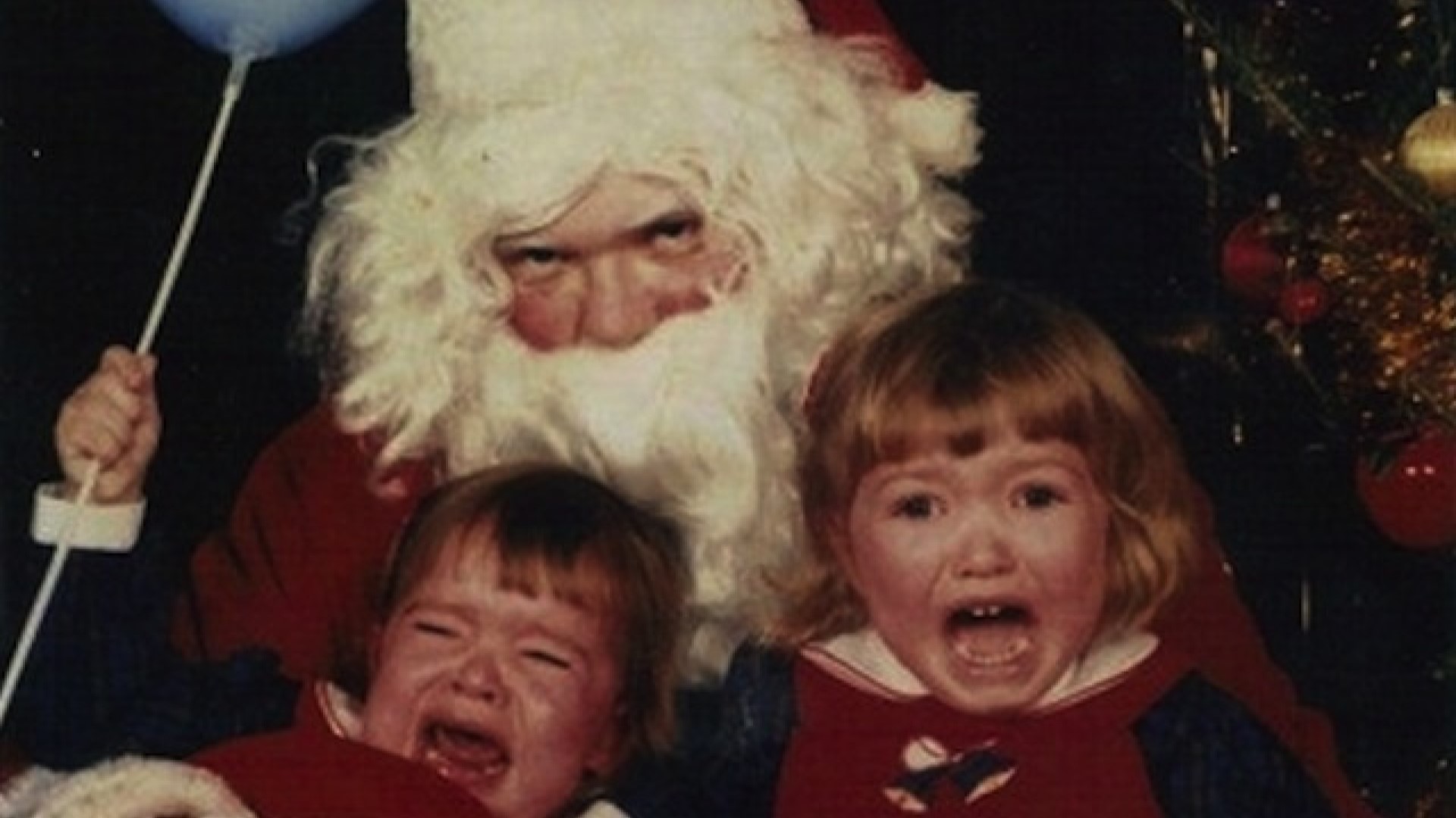 santa-and-crying-kids - Kiss My Geek